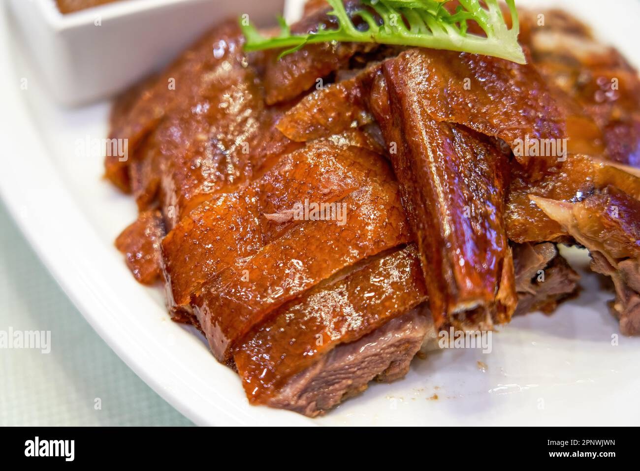 A crispy and delicious Cantonese-style crispy roast goose Stock Photo ...