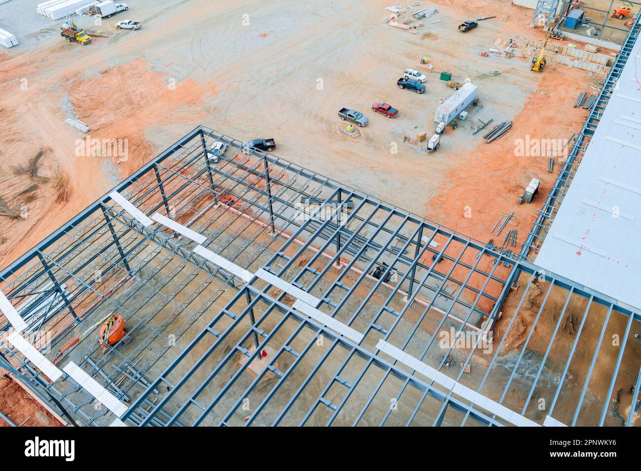 Steel truss frame construction of warehouse building as part ...