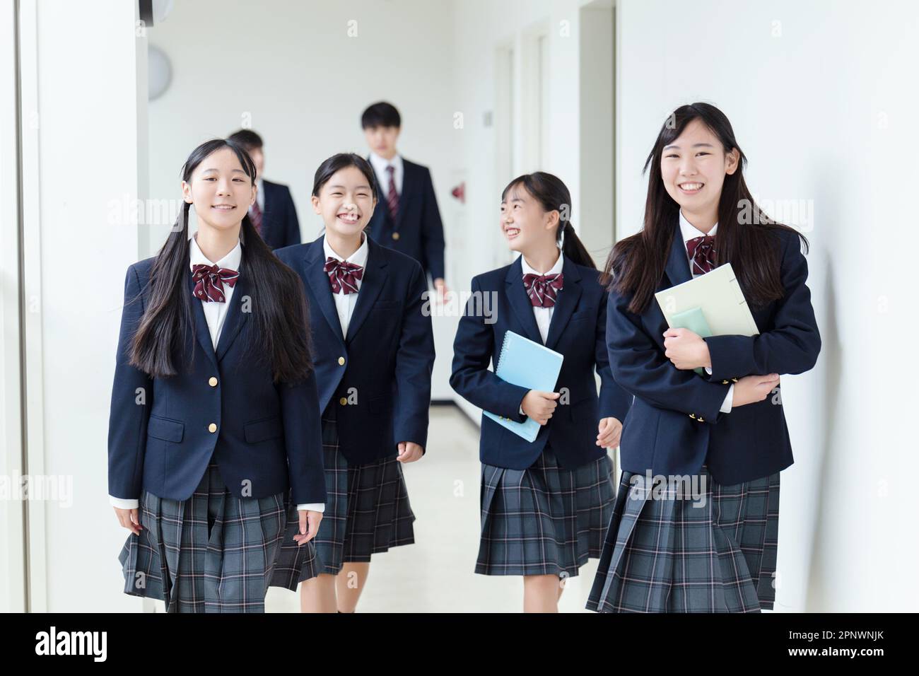 Girl in school hallway hi-res stock photography and images - Alamy