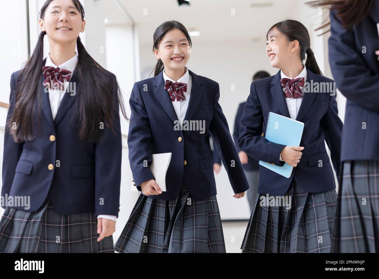 High school students walking in the hallway Stock Photo - Alamy