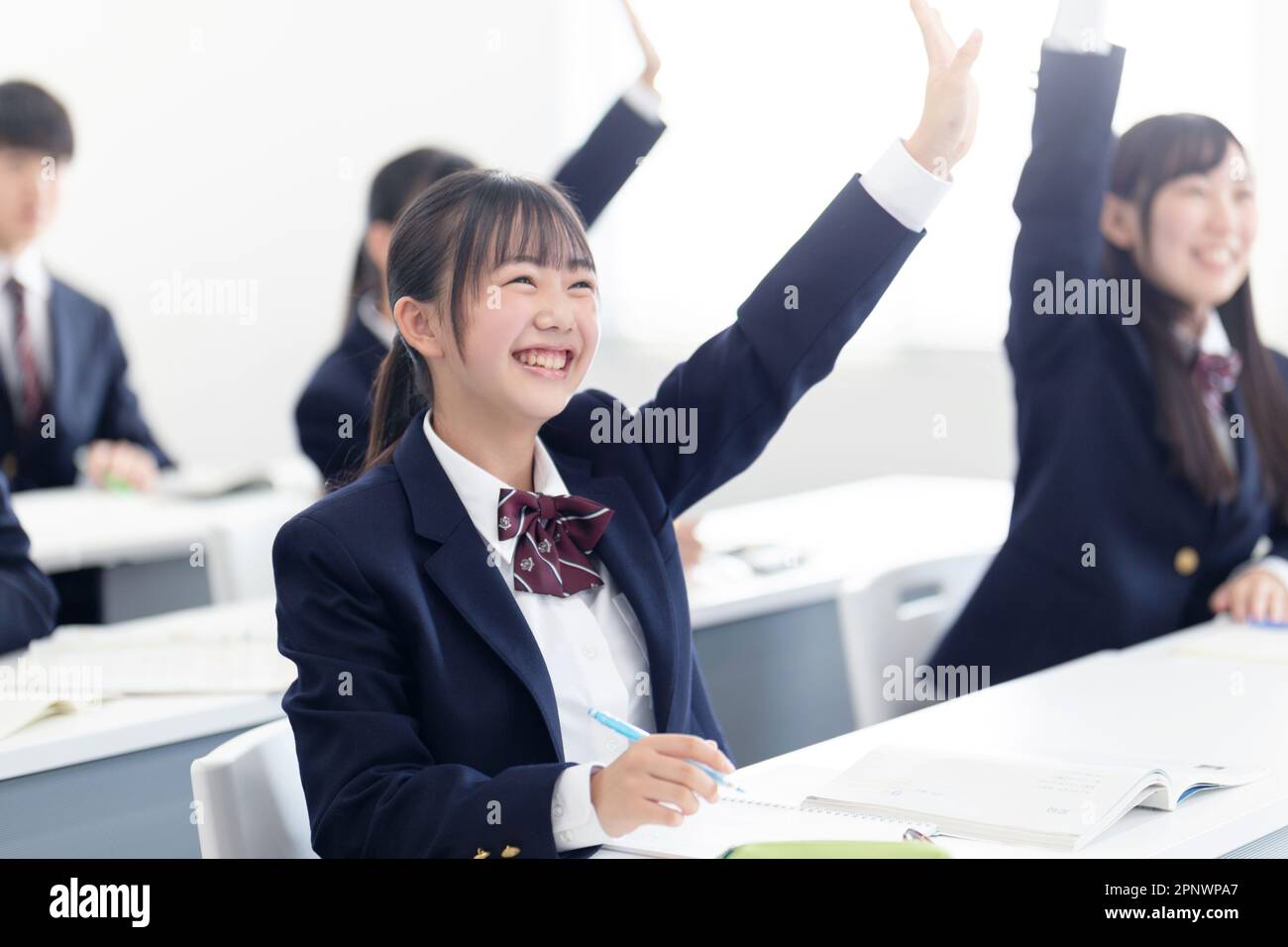 High school raise hand hi-res stock photography and images - Alamy