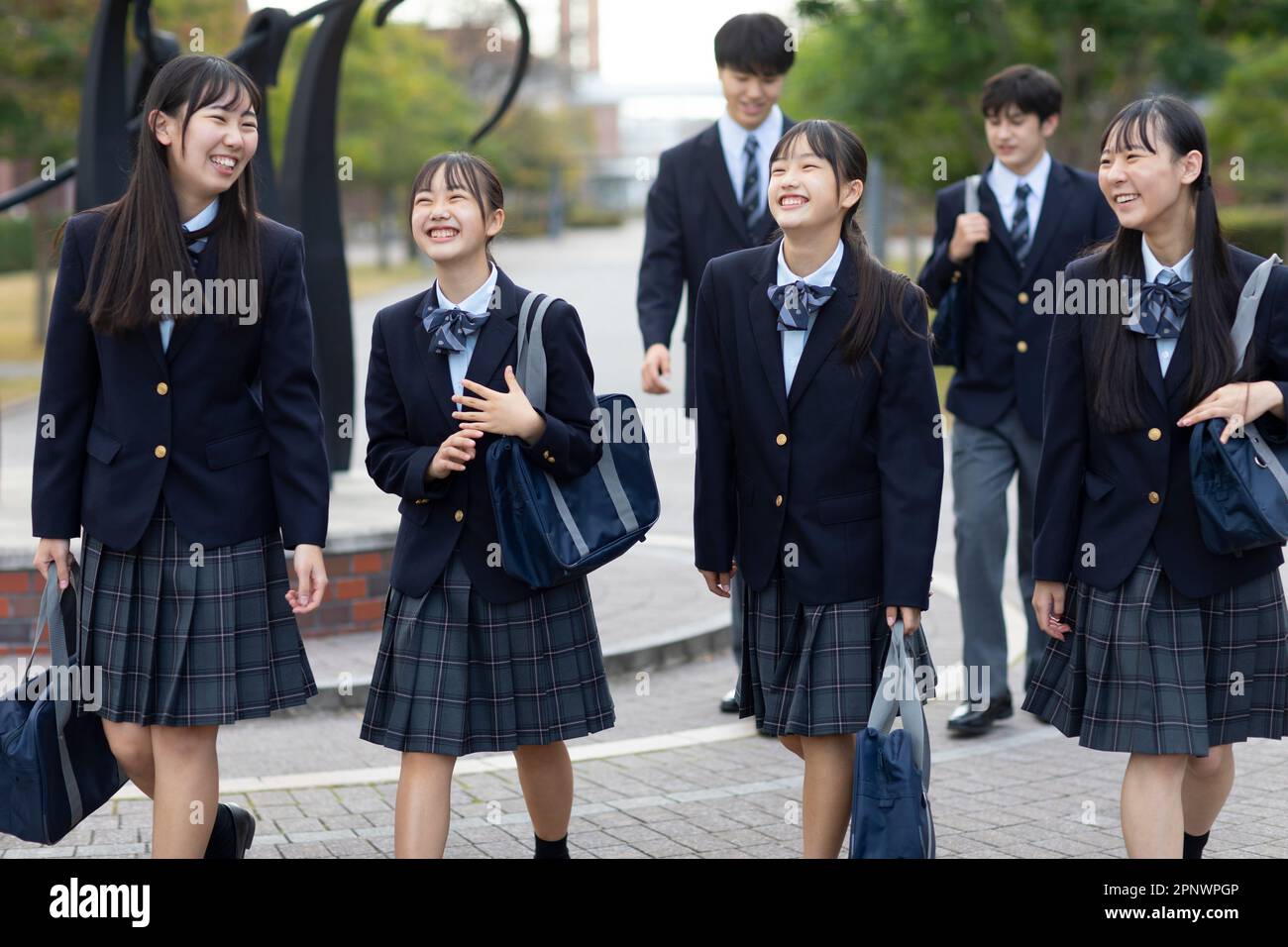 High school students leaving school Stock Photo - Alamy