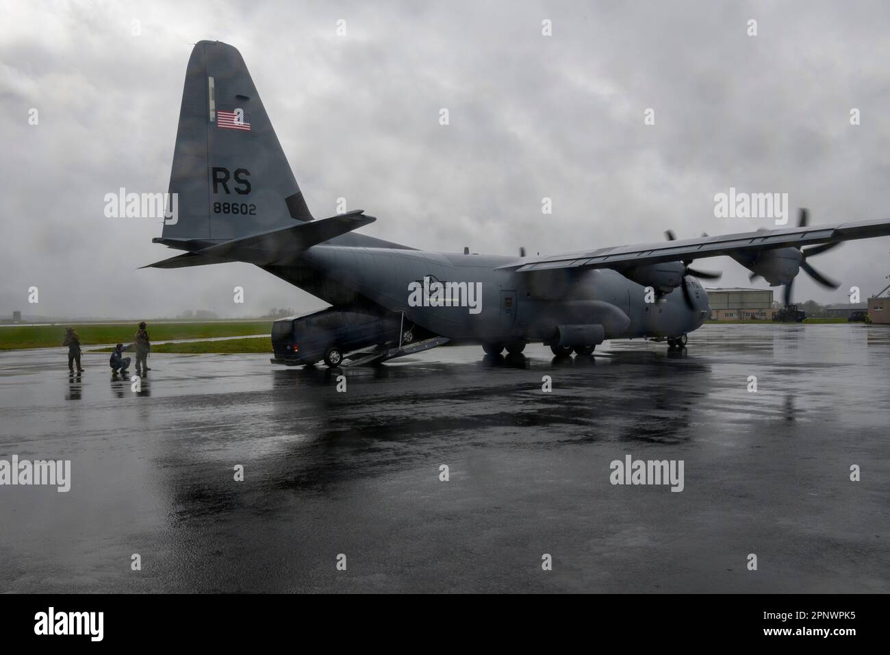U.S. Airmen with the 435th Air Ground Operations Wing perform an engine ...