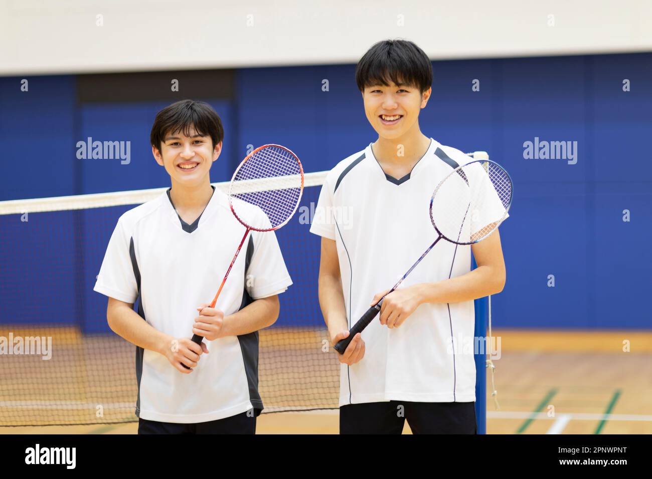 High school students standing with rackets Stock Photo - Alamy