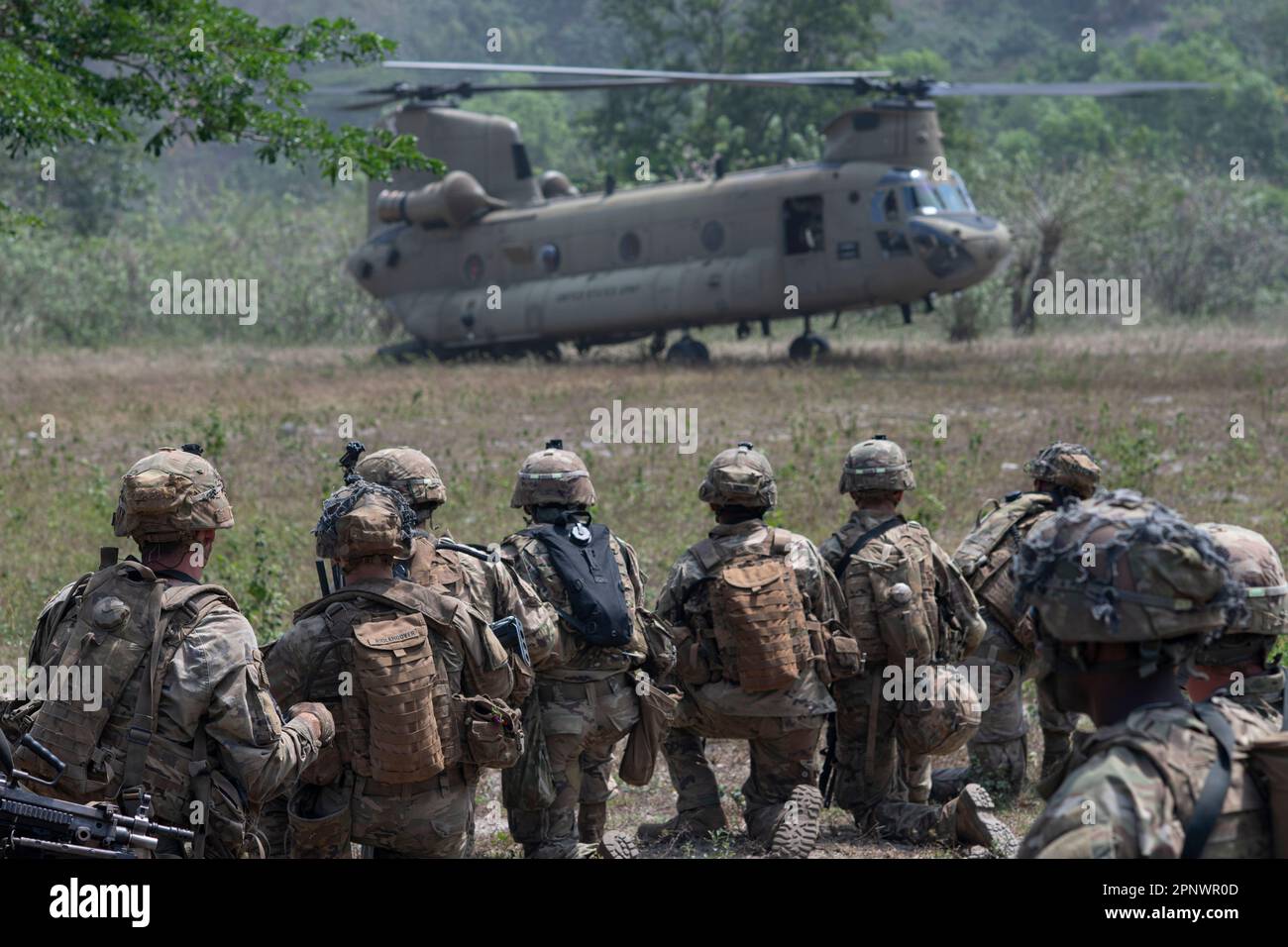 U.S. Soldiers, with the 25th Infantry Division, prepare to board a CH ...