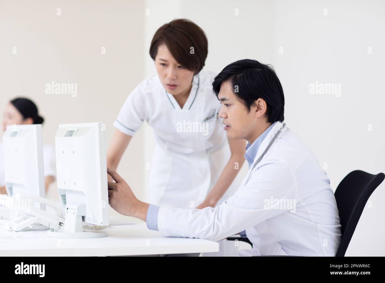Doctor watching the monitor Stock Photo - Alamy
