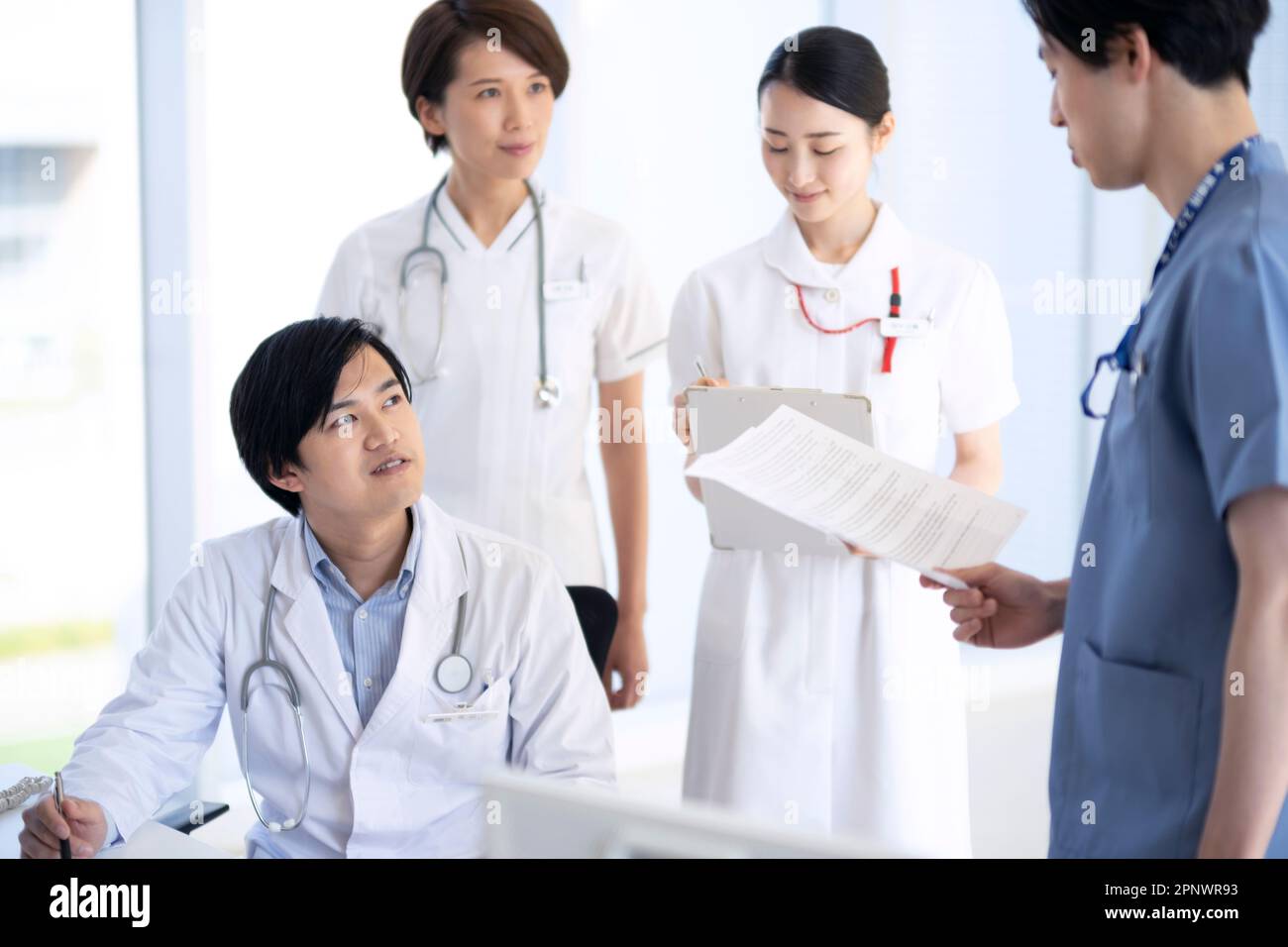 Doctor and nurse watching the monitor Stock Photo - Alamy