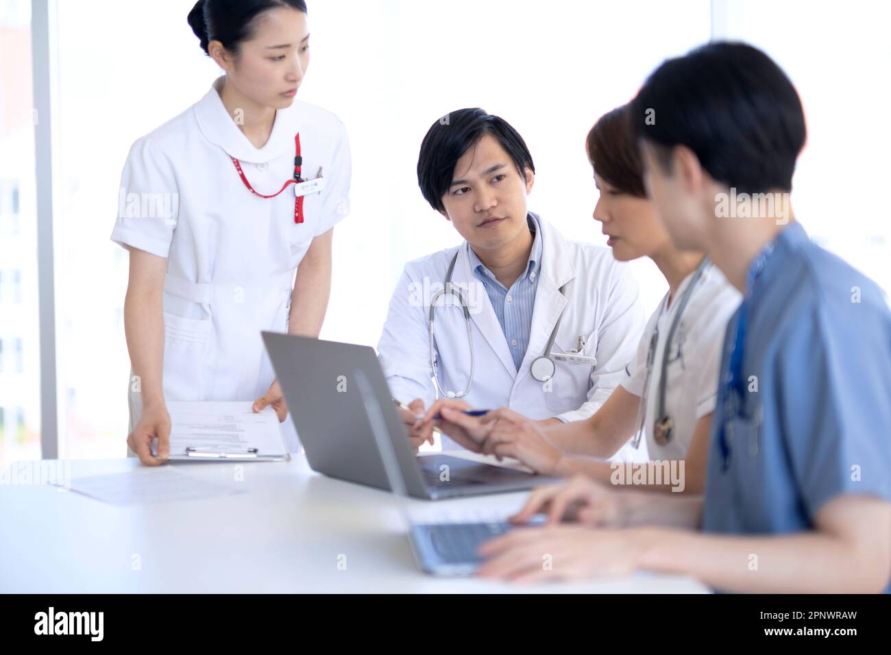 Doctor and nurse in conference Stock Photo - Alamy