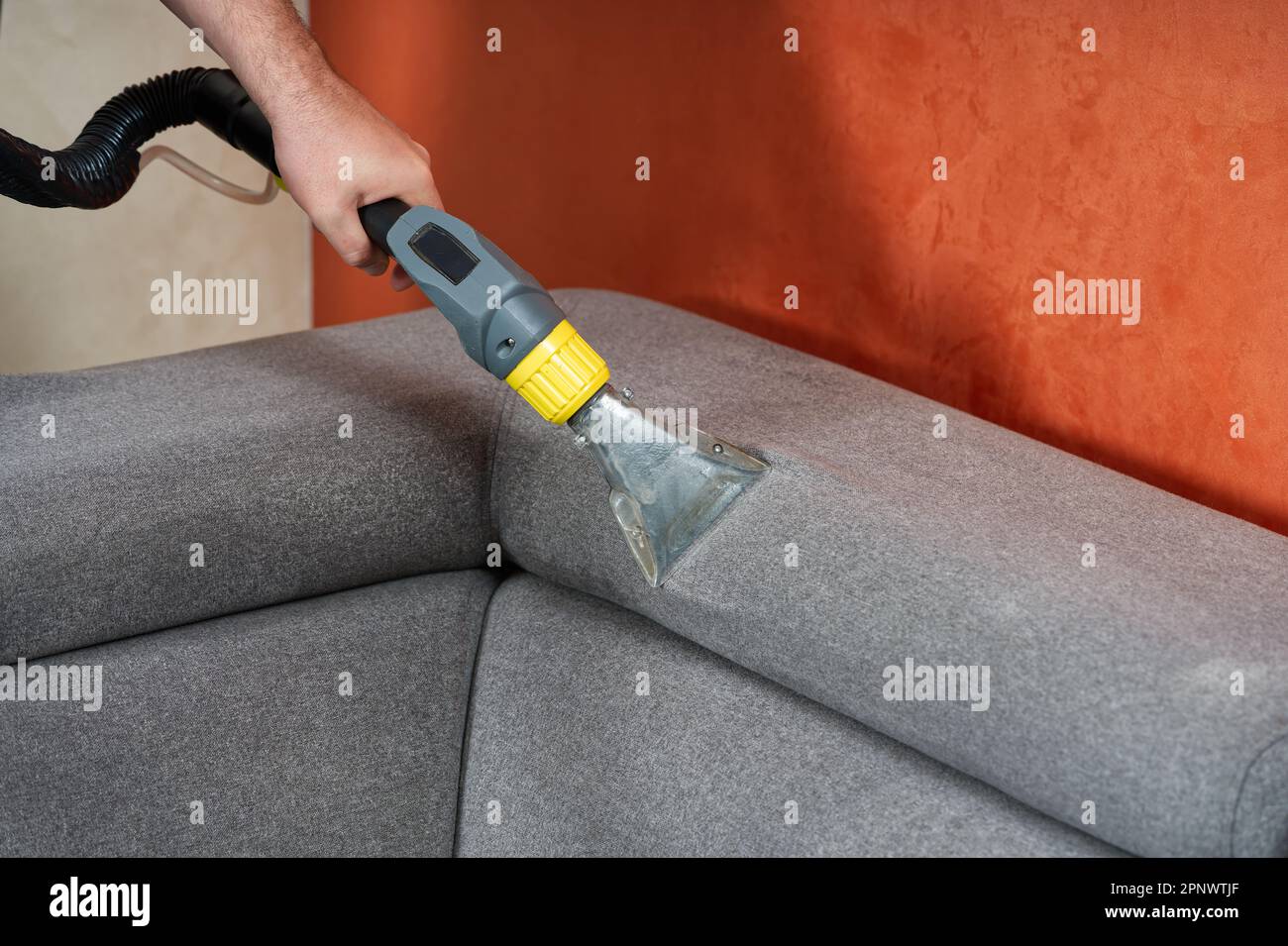 Sofa chemical cleaning with professionally extraction method. Wet ...