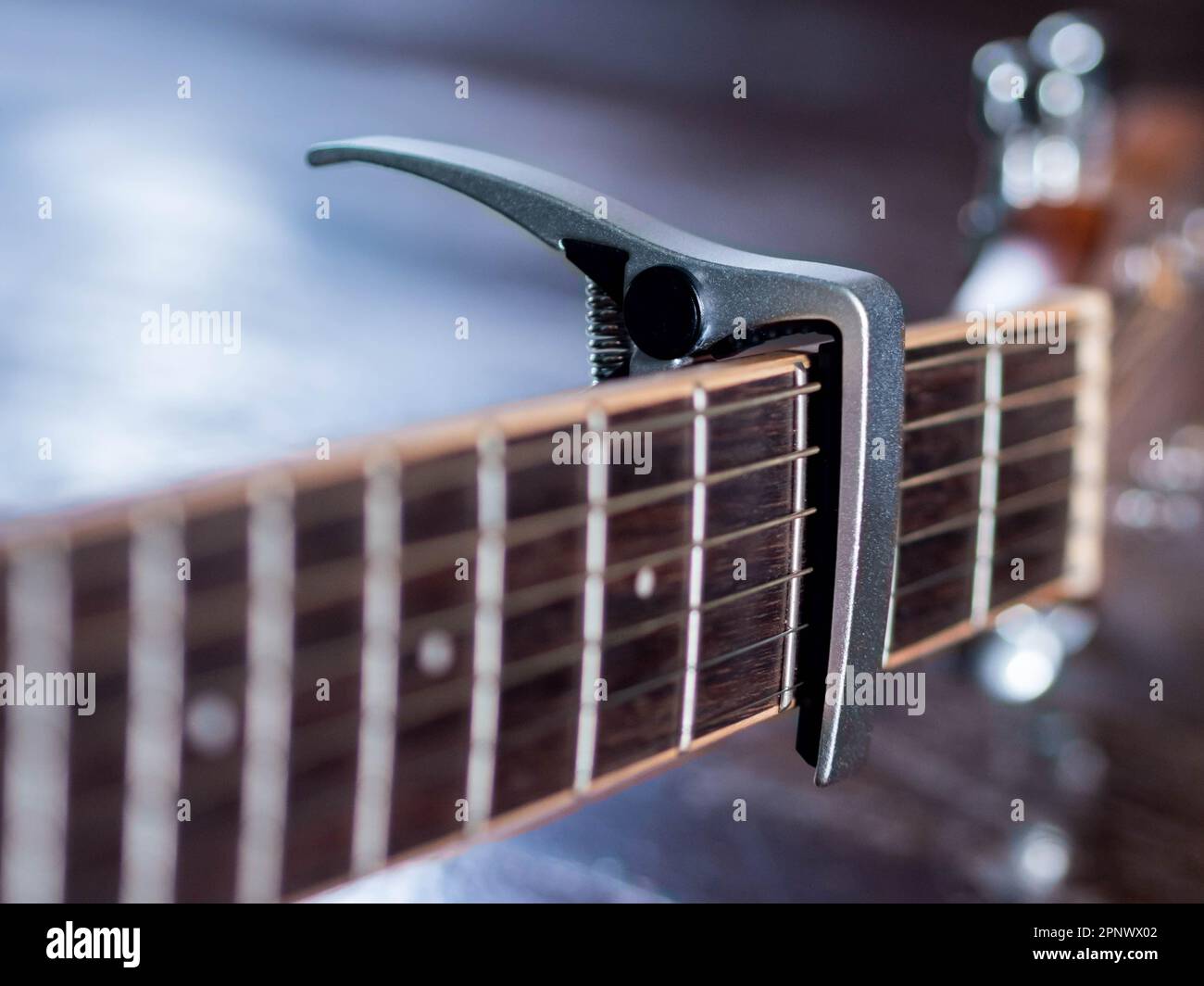 Guitar capo hi-res stock photography and images - Alamy