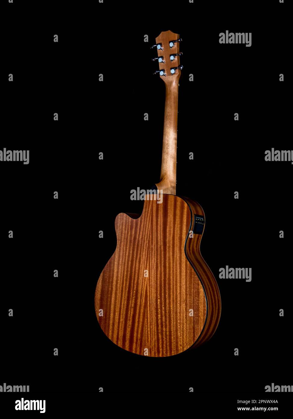 Back of acoustic guitar on black background Stock Photo - Alamy