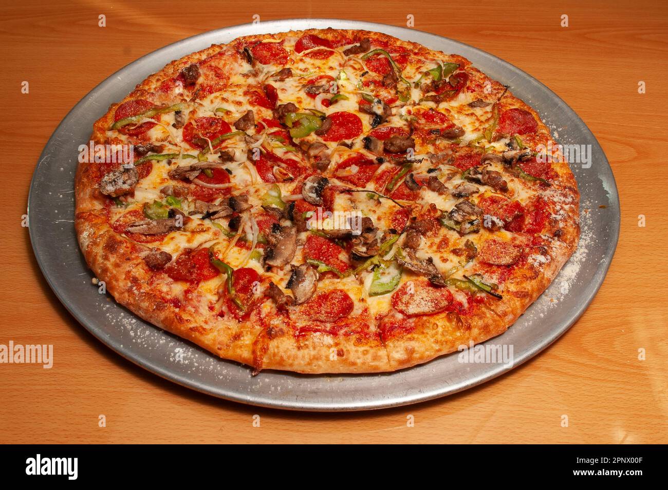 Delicious tomato sauce cheese covered hot and tasty supreme pizza pie ...
