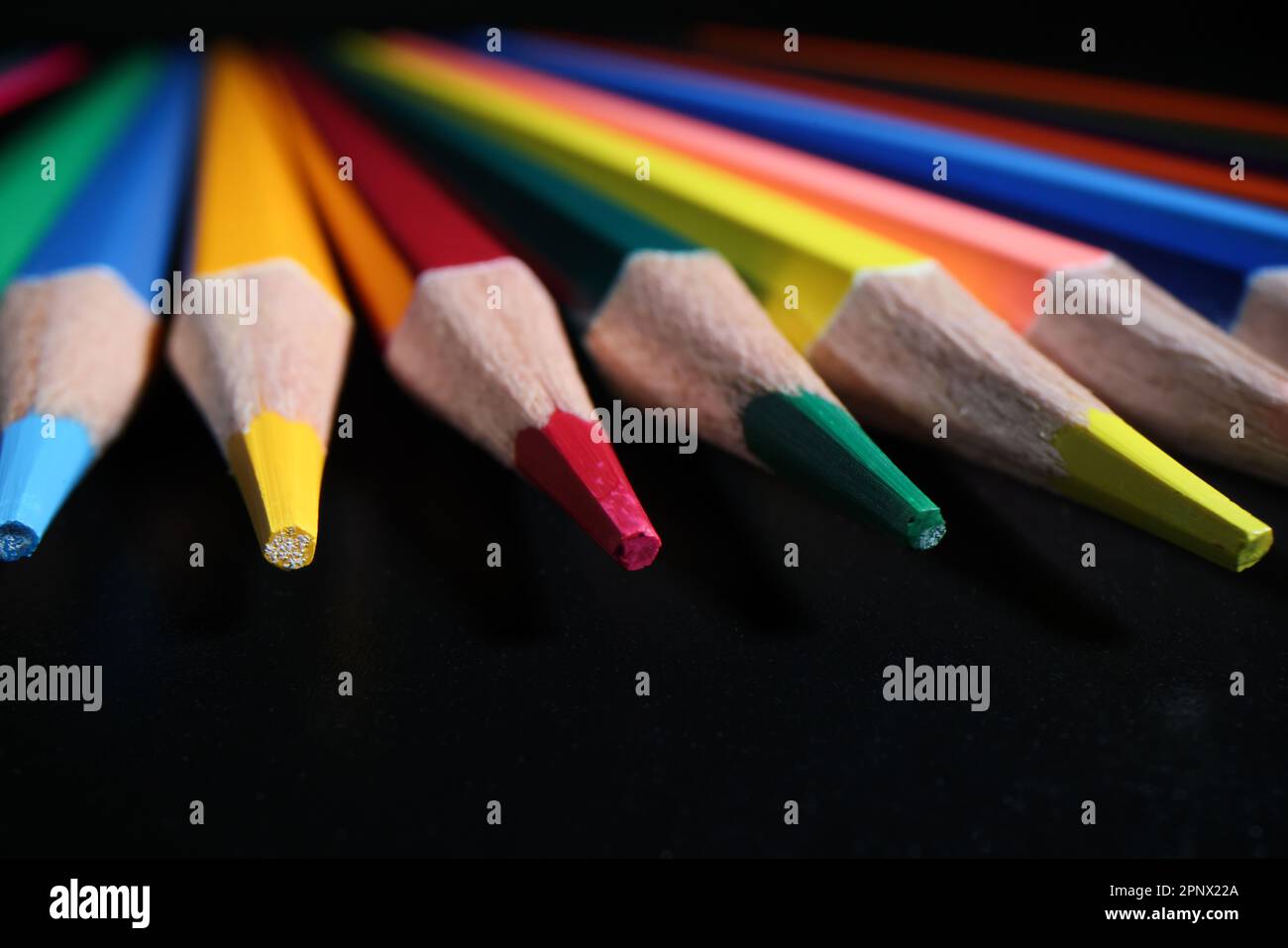 Sharpened tips of multi-colored pencils ready for drawing Stock Photo ...