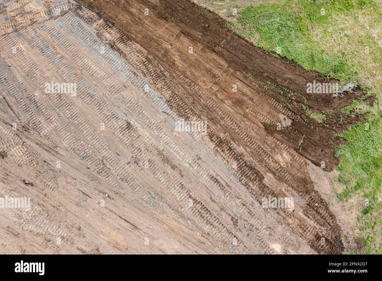 flattening ground on construction site. construction background. aerial ...