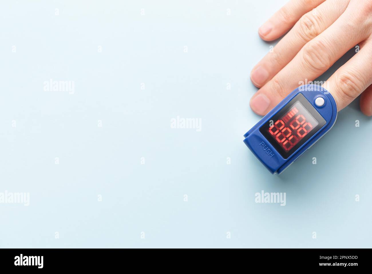 Pulse oximeter measuring oxygen saturation in blood and heart rate ...