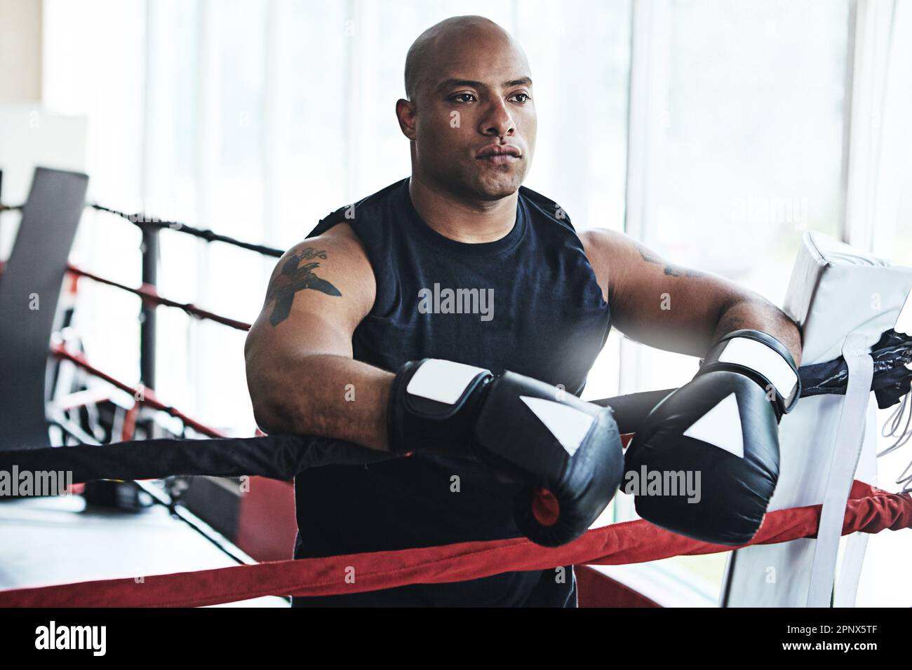 Boxing is all about being physically and mentally tough. a man training ...