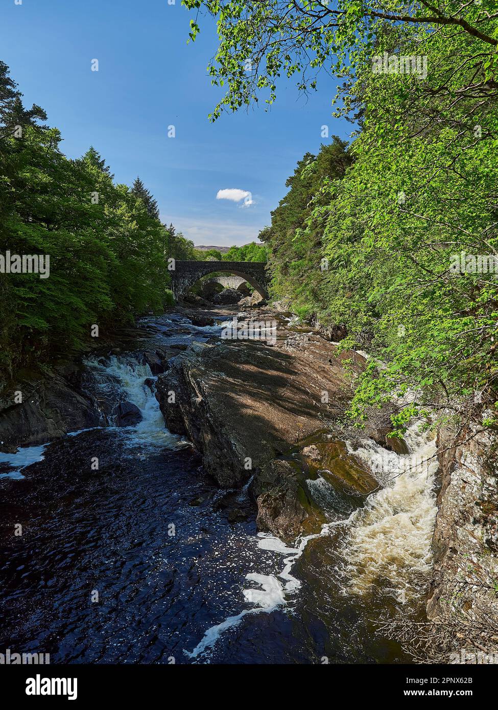 invermoriston falls near Loch Ness in Scotland on a sunny day with ...