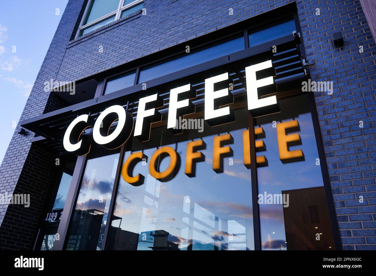 Coffee sign and its reflection a coffee shop window Stock Photo - Alamy