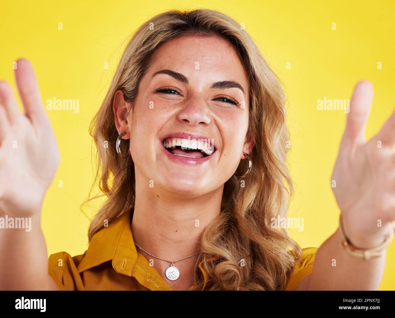 Woman, welcome hug and happy in portrait with hand gesture, love and ...