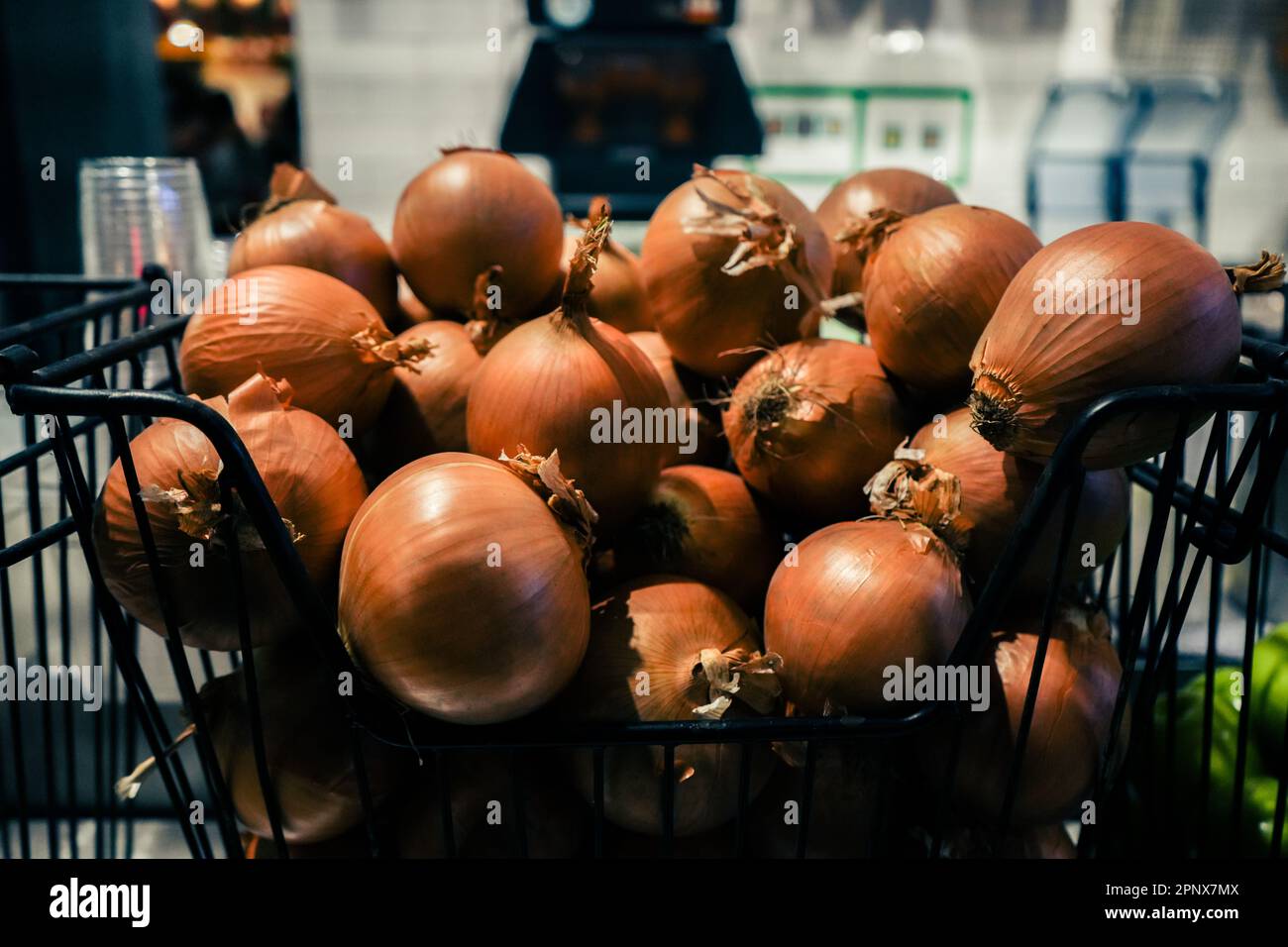 Yellow onions in a basket, local market Stock Photo - Alamy