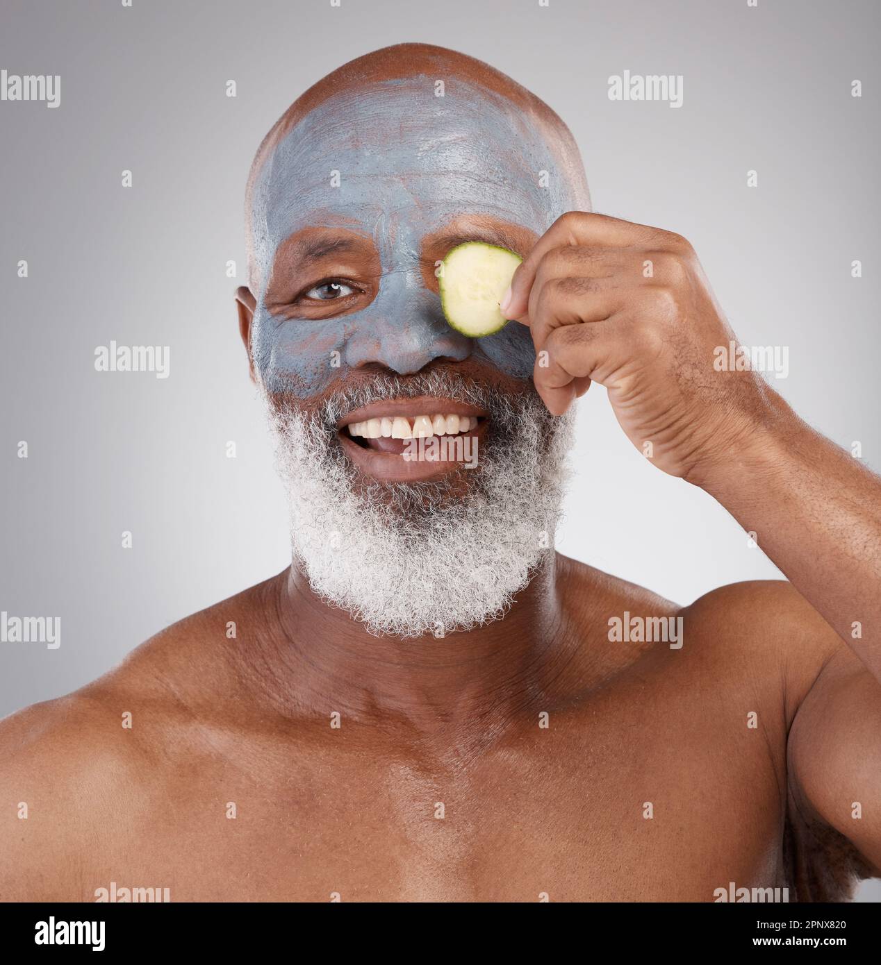 Face mask, cucumber and black man with smile in portrait, beauty and ...