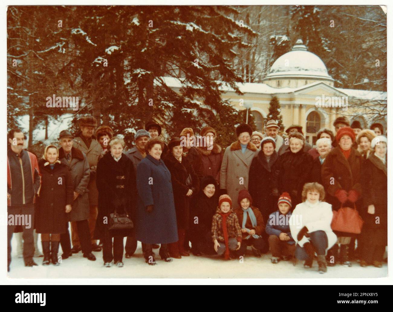 Vintage photo shows group of people on winter vacation Stock Photo - Alamy