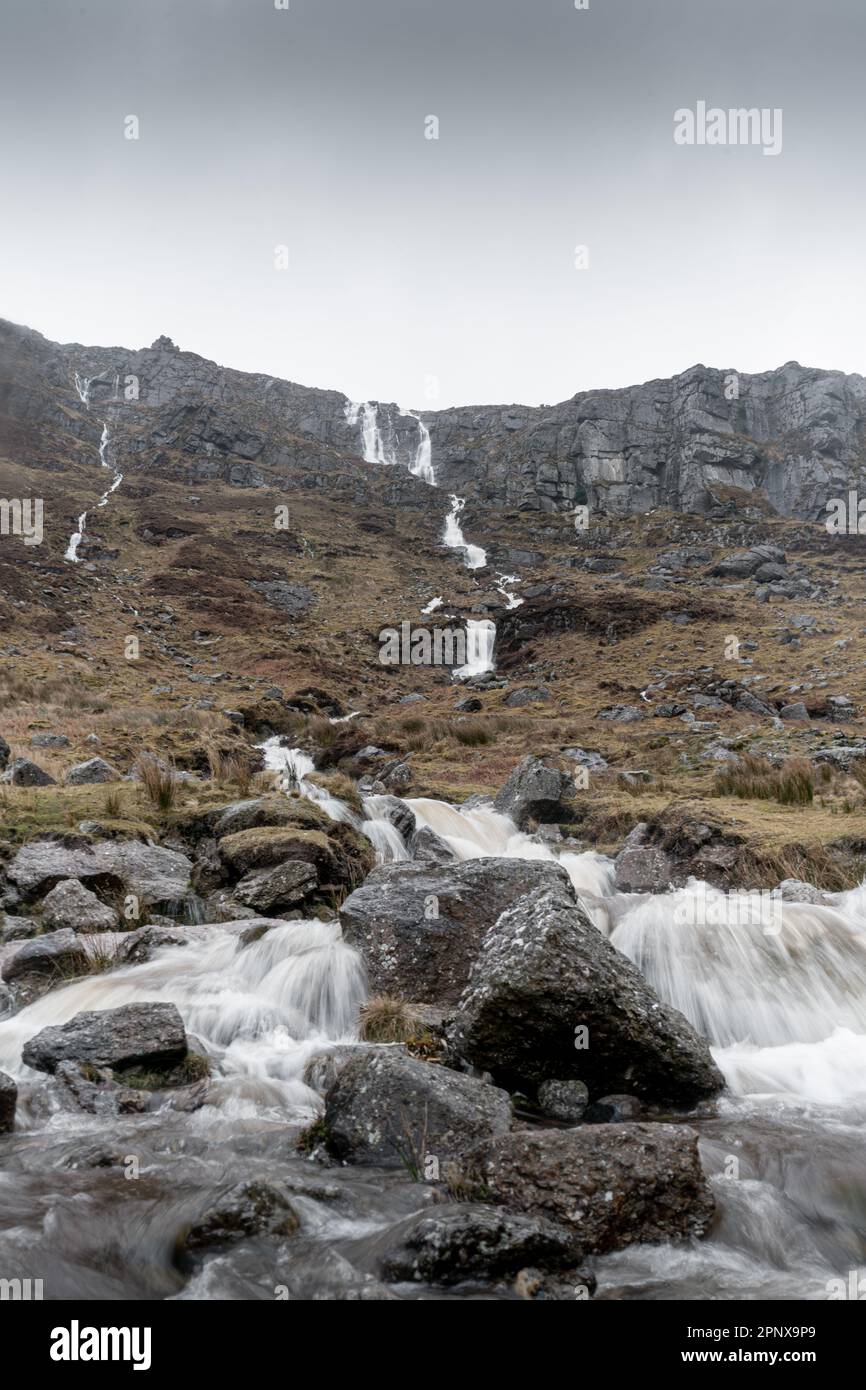 An idyllic scene of a rocky mountain landscape featuring an Irish ...