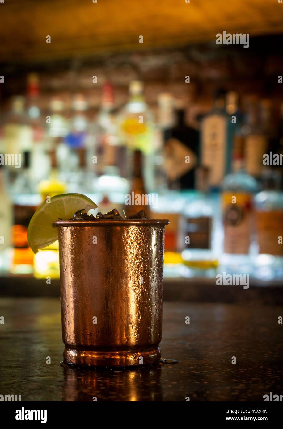 moscow mule cocktail in copper mug at interior bar counter Stock Photo ...