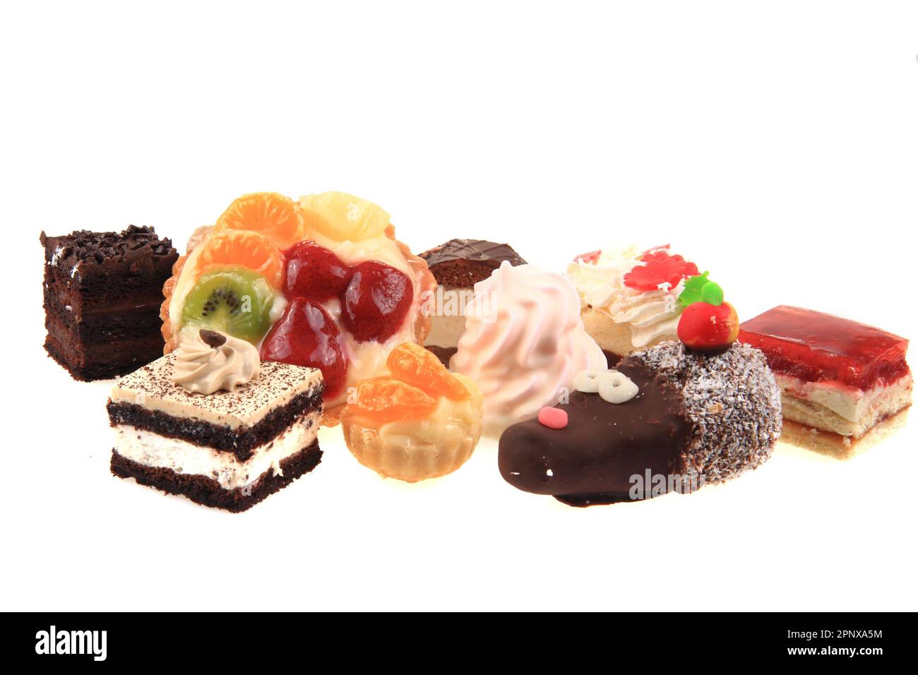 sweet color desserts isolated on the white background Stock Photo - Alamy