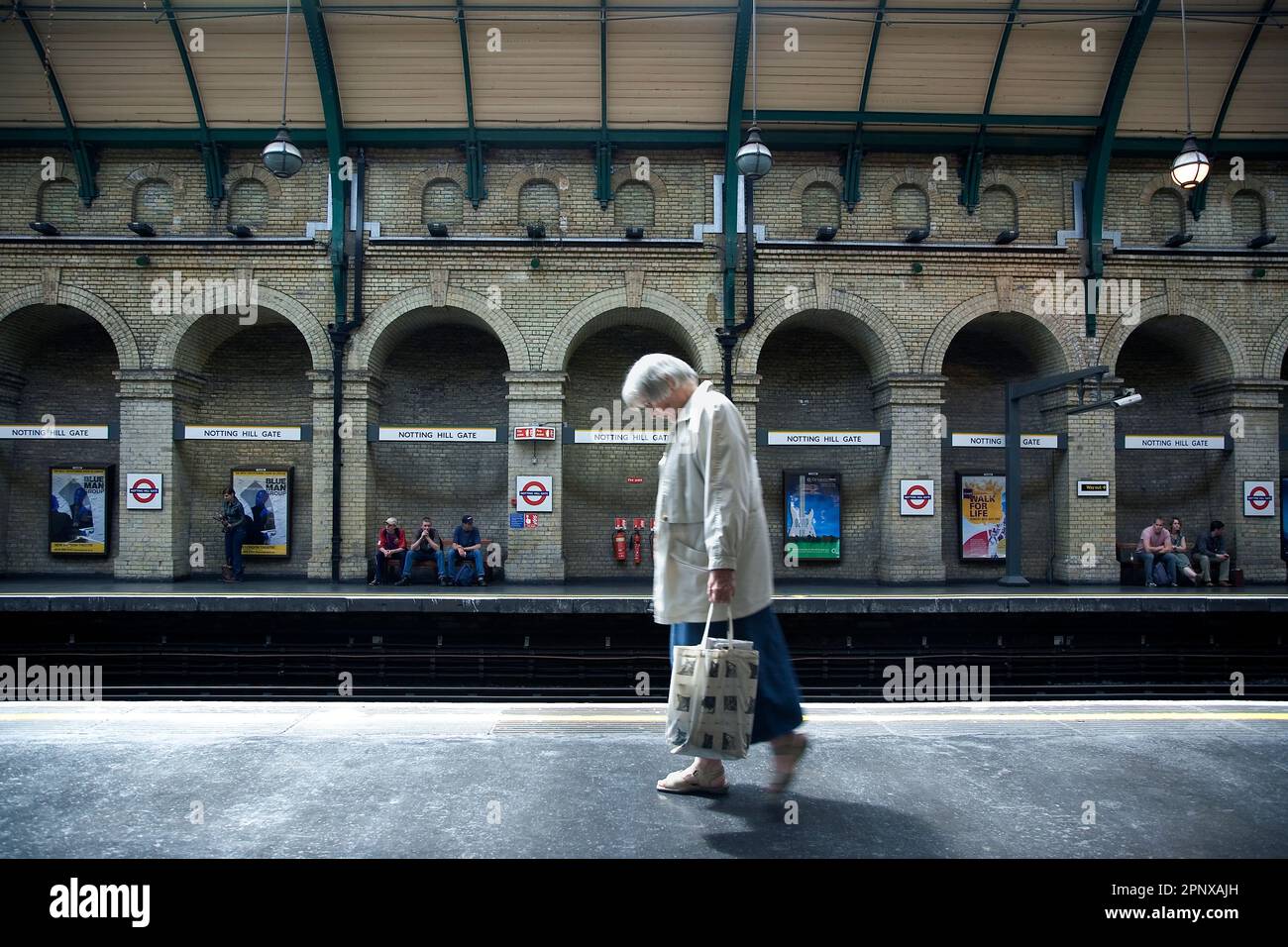 Notting Hill tube lady Stock Photo - Alamy