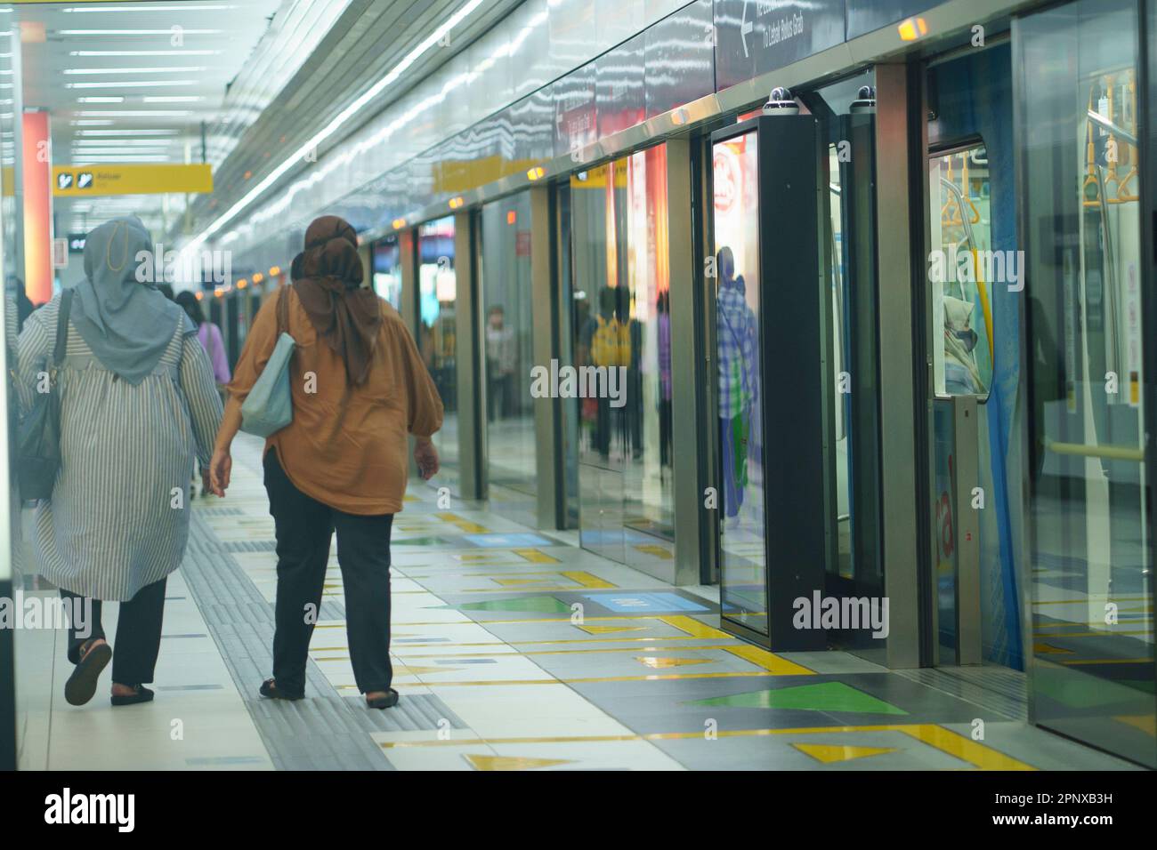 Woman indonesia roundabout mrt station hi-res stock photography and ...
