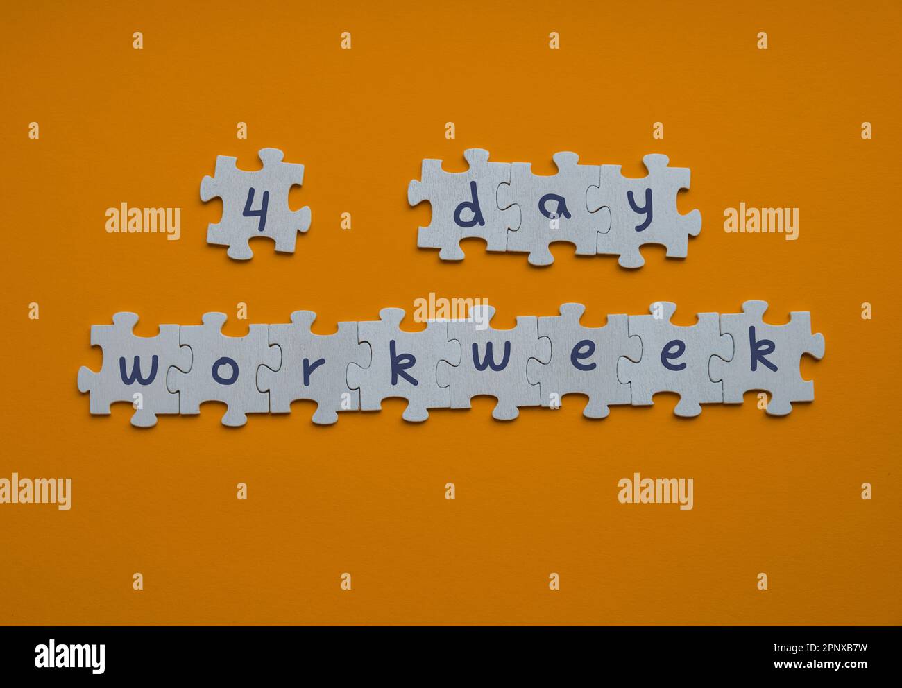 4 day work week symbol on puzzles four day working week concept. Modern approach doing business ...