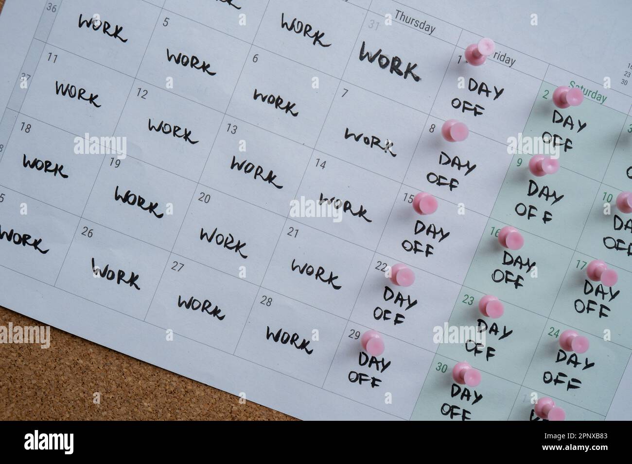 4 day work week printed calendar with pink pins on three days off in week weekend days four day ...