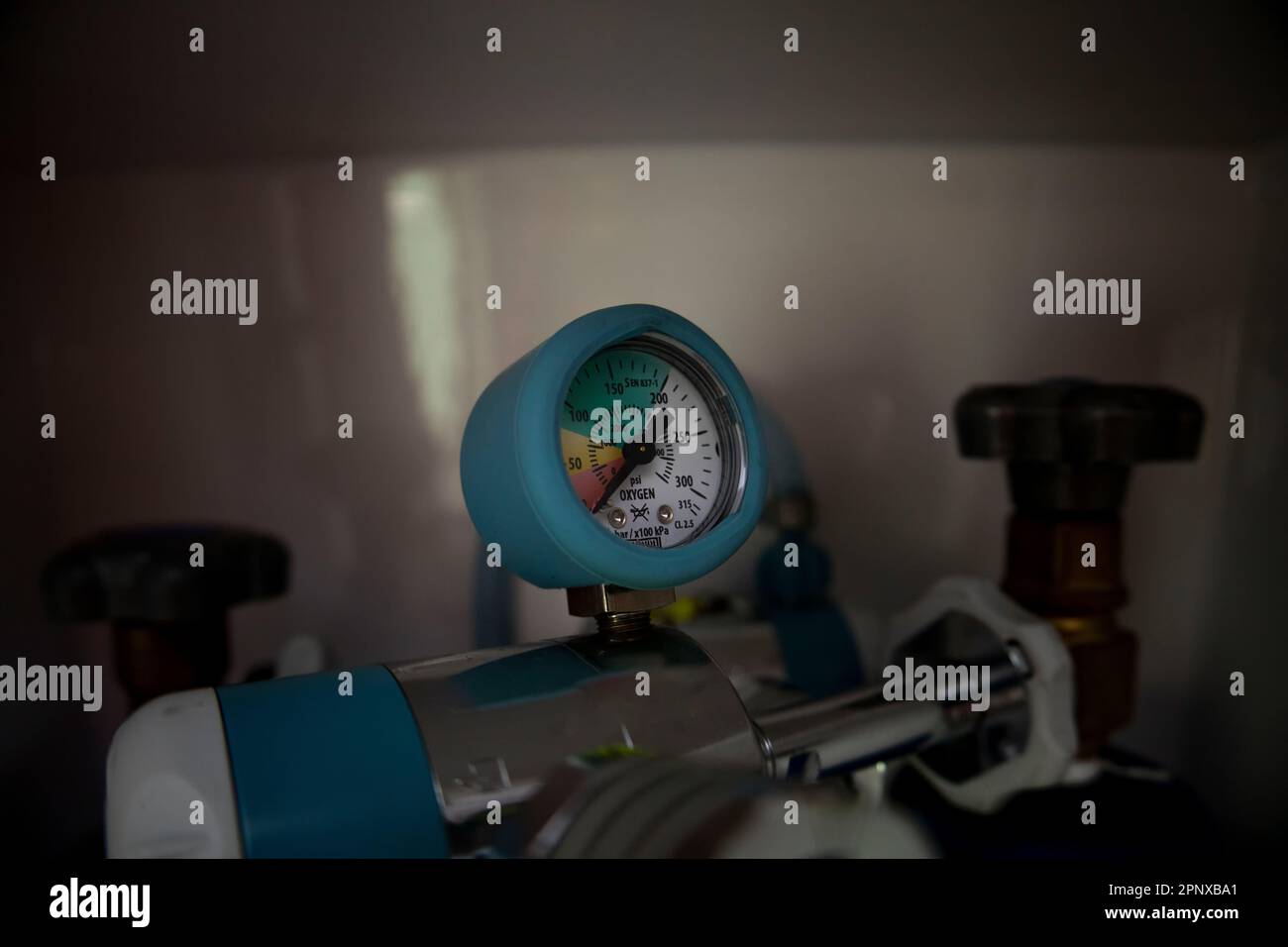 Reducer for medical oxygen in an ambulance Stock Photo - Alamy