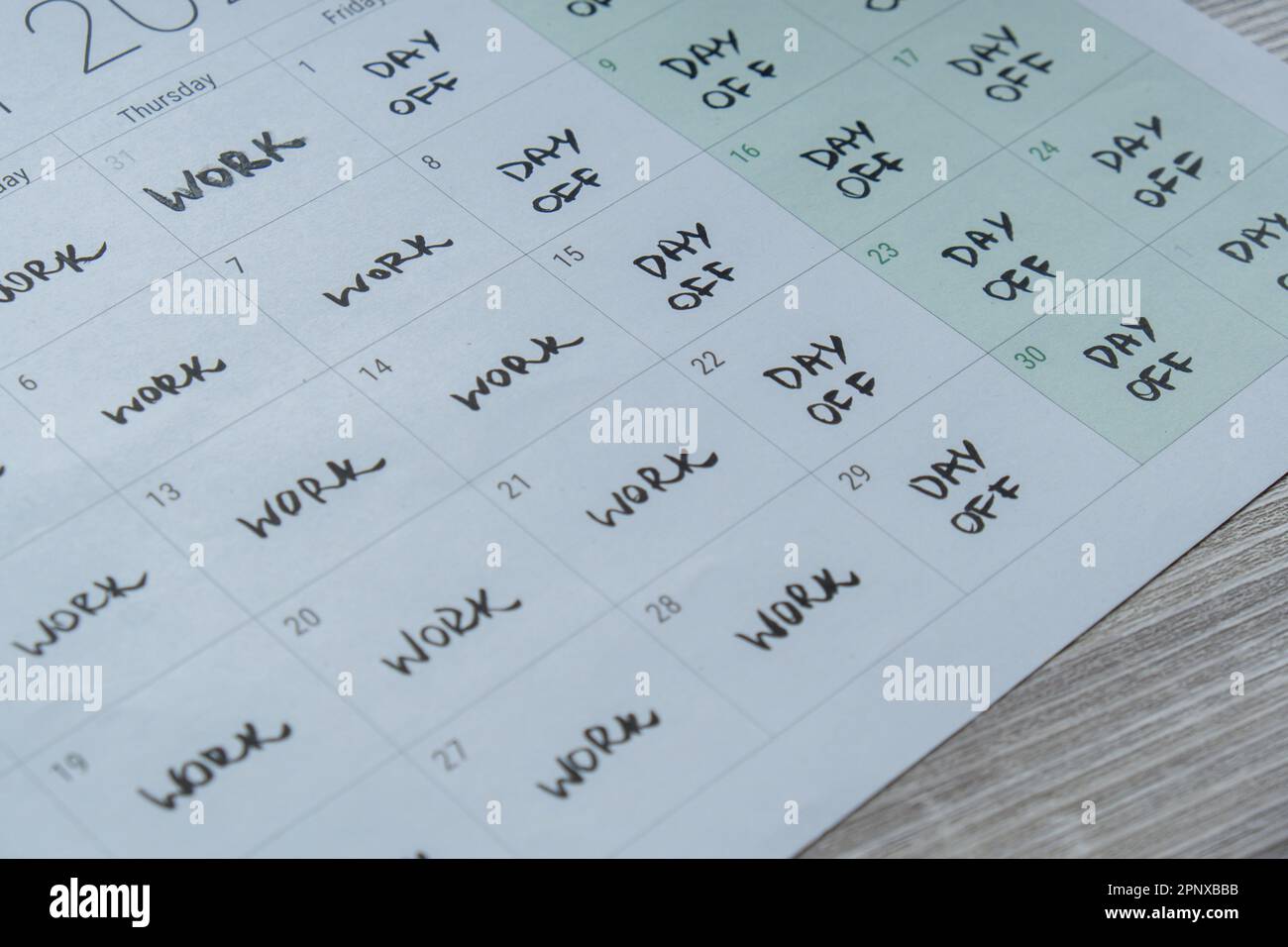 4 day work week printed calendar with weekend days four day working week concept. Modern ...