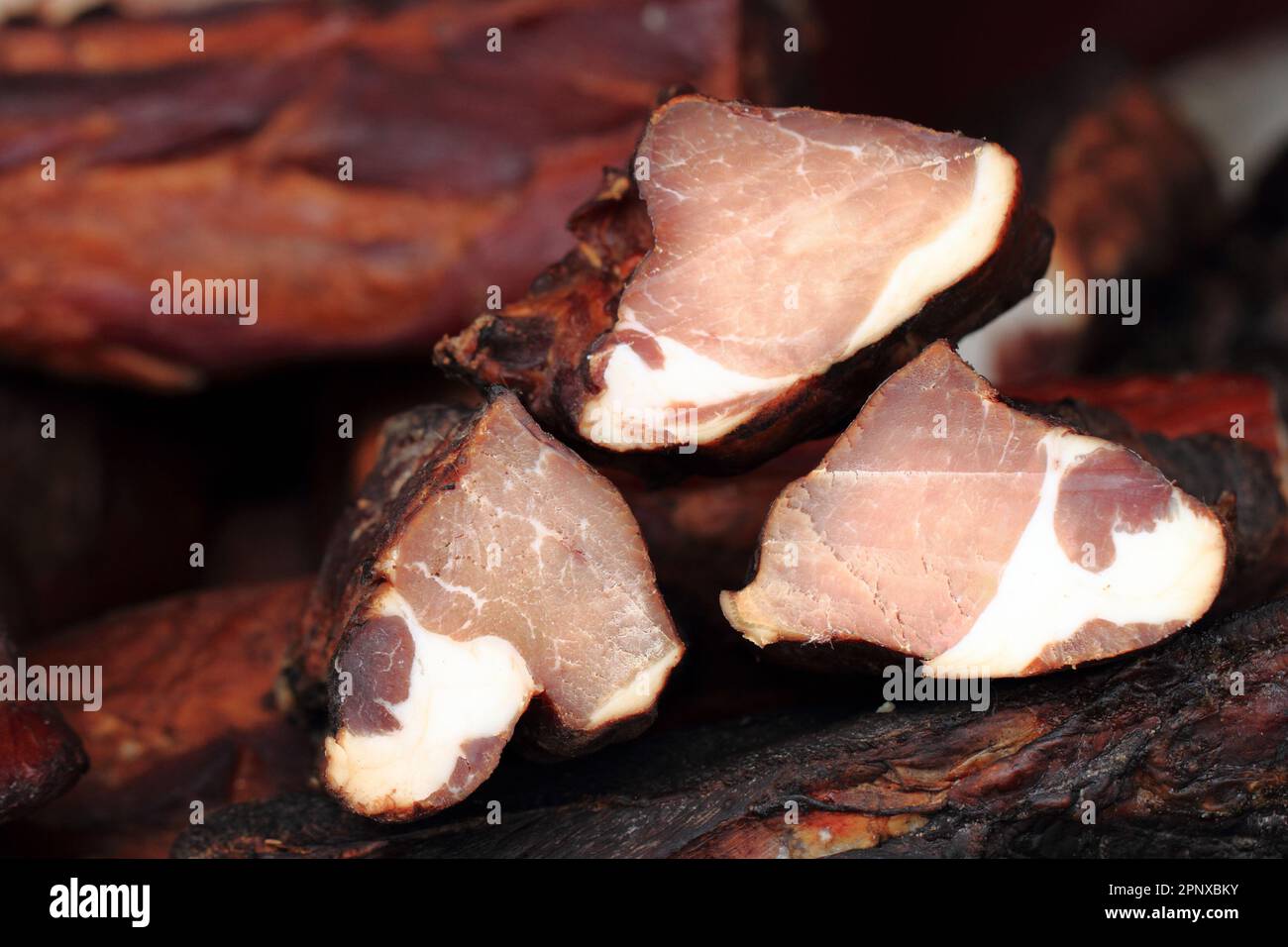 smoked pig meat as nice gourmet background Stock Photo - Alamy