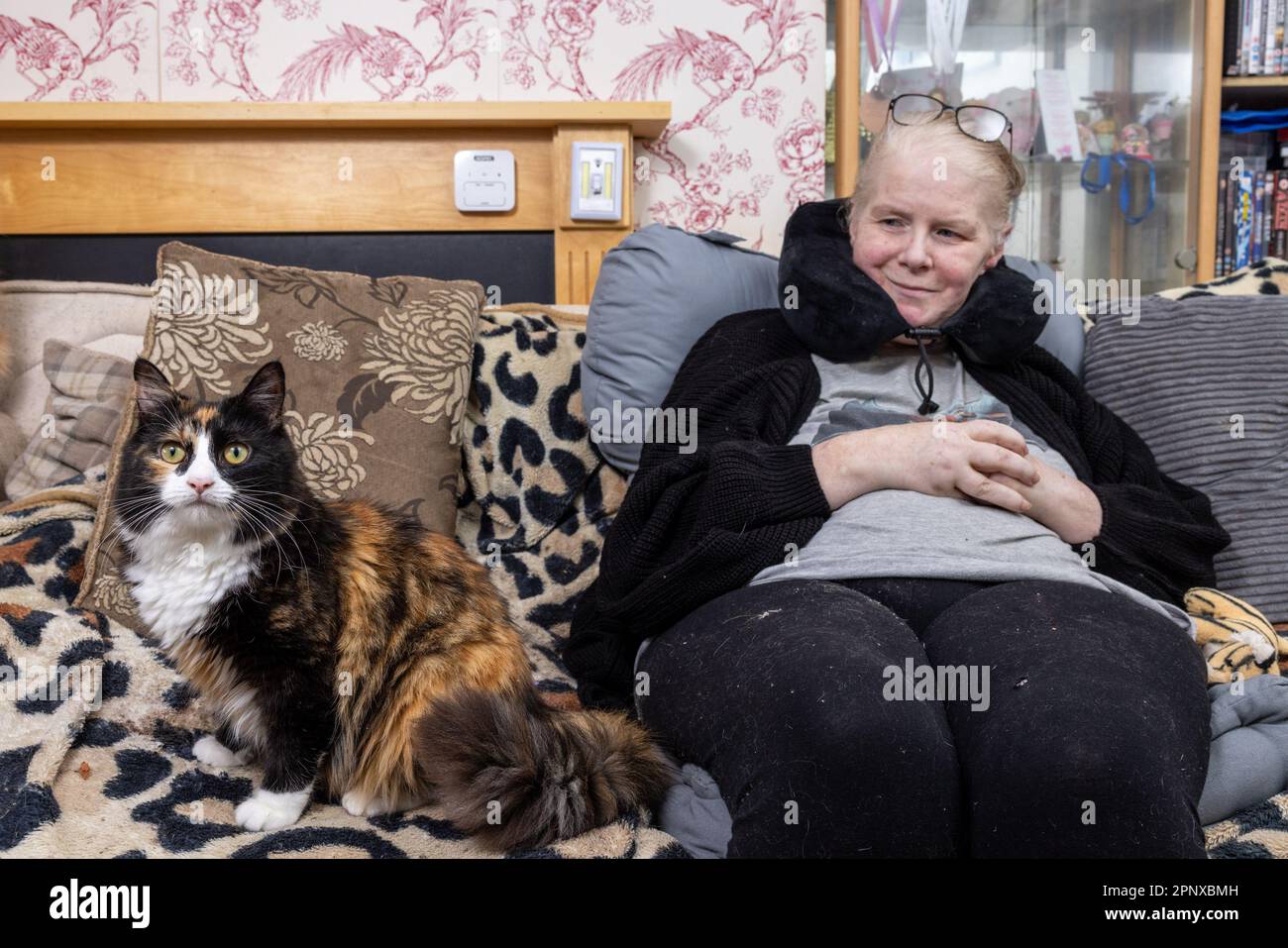 EDITORIAL USE ONLY Amanda Jameson from Prescot, with her pet cat Willow ...