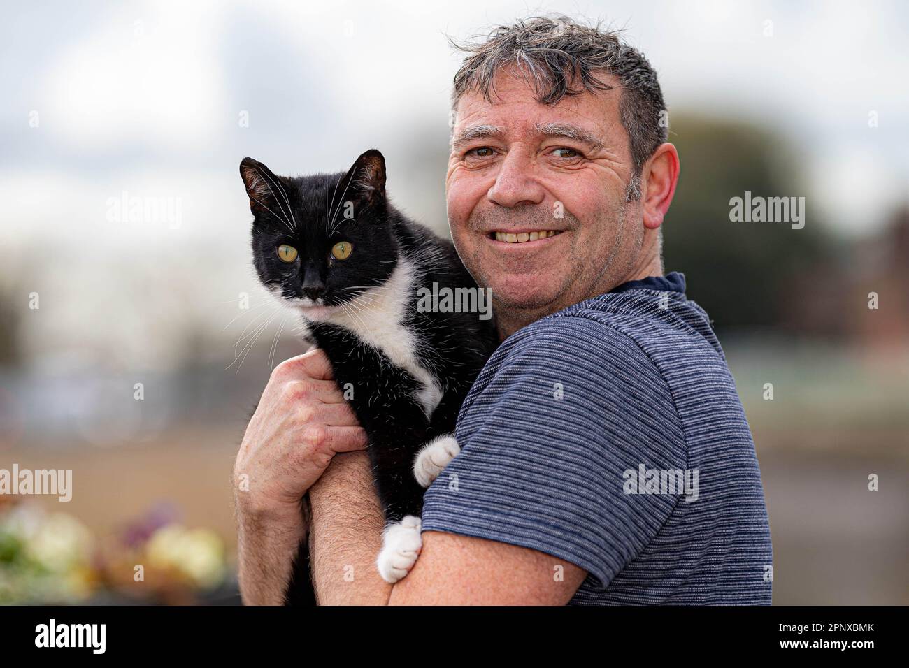 EDITORIAL USE ONLY Gavin Dalley from Somerset, with his pet cat Elsa ...