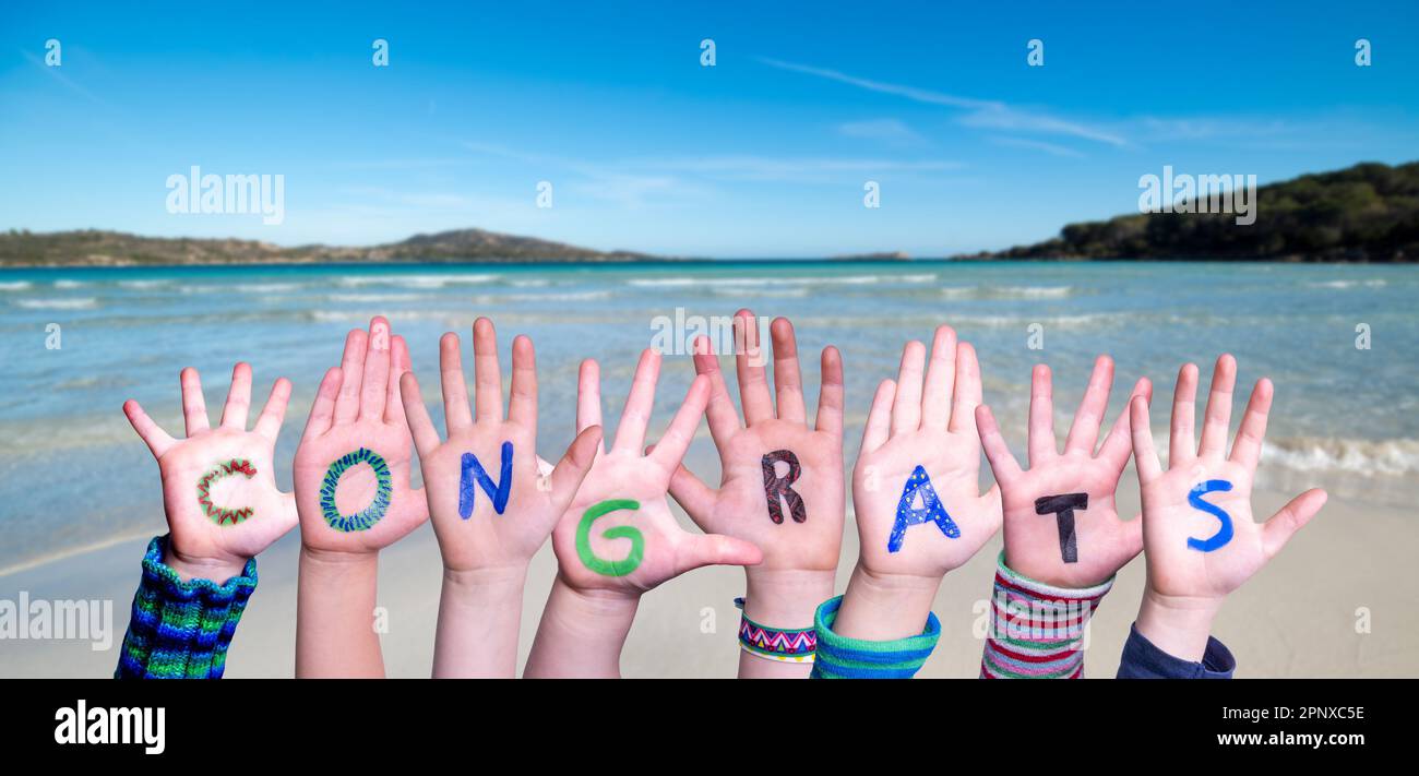 Children Hands Building Word Congrats, Ocean And Sea Stock Photo - Alamy