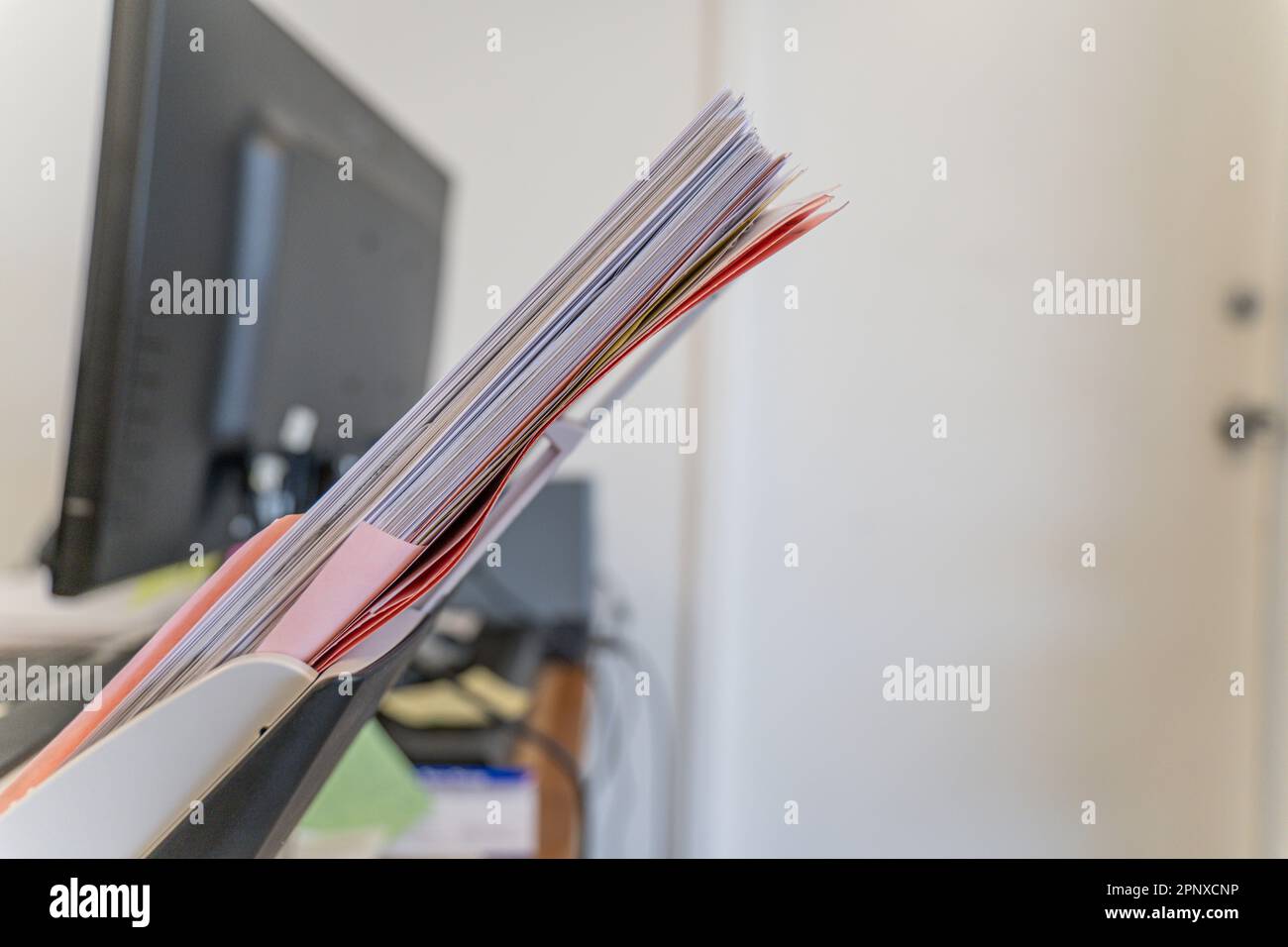 Desktop paper document scanner with stack of documents Stock Photo - Alamy