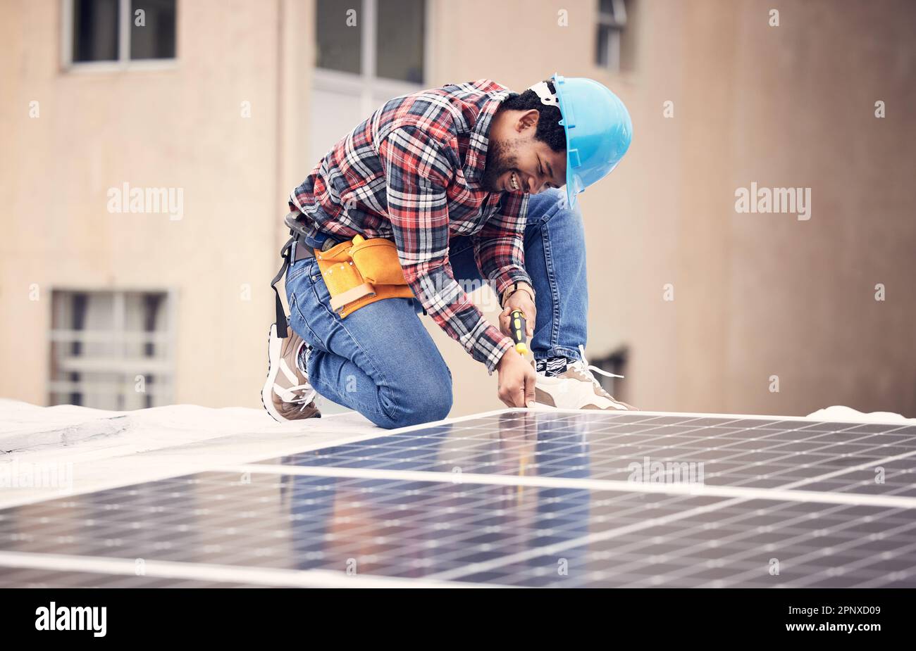 Solar panel install, engineer and black man on roof, sustainable or ...
