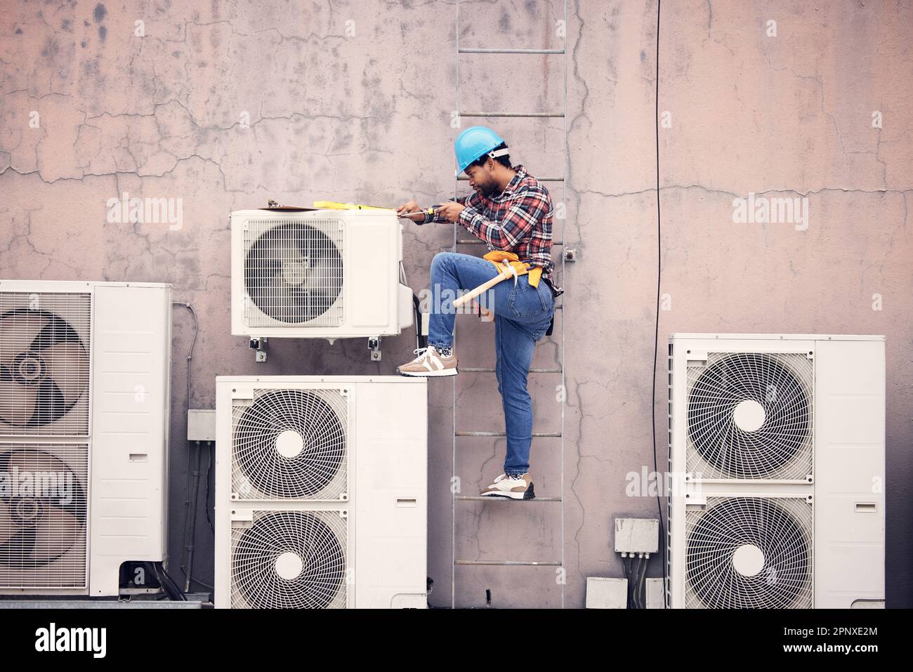 Black man, ac repair and technician, maintenance with engineering and ...