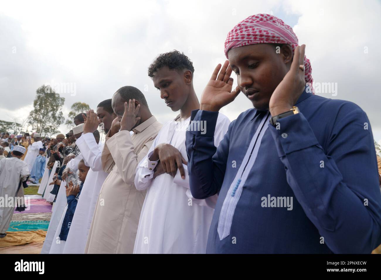 Kenyan Muslims pray in an open ground during the Eid al-Fitr prayers in ...