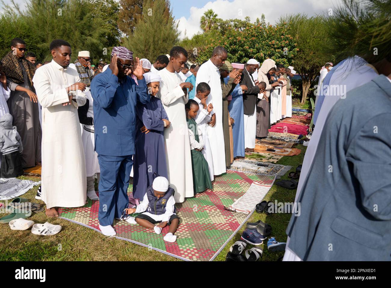 Kenyan Muslims pray in an open ground during the Eid al-Fitr prayers in ...