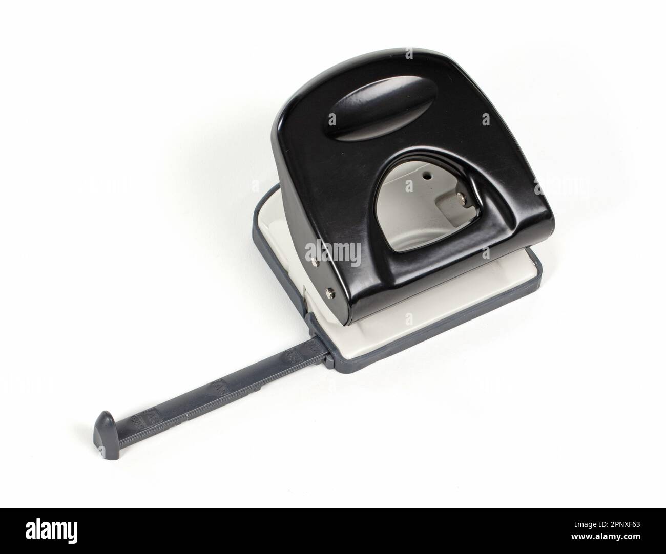 Black office puncher over a white background Stock Photo - Alamy