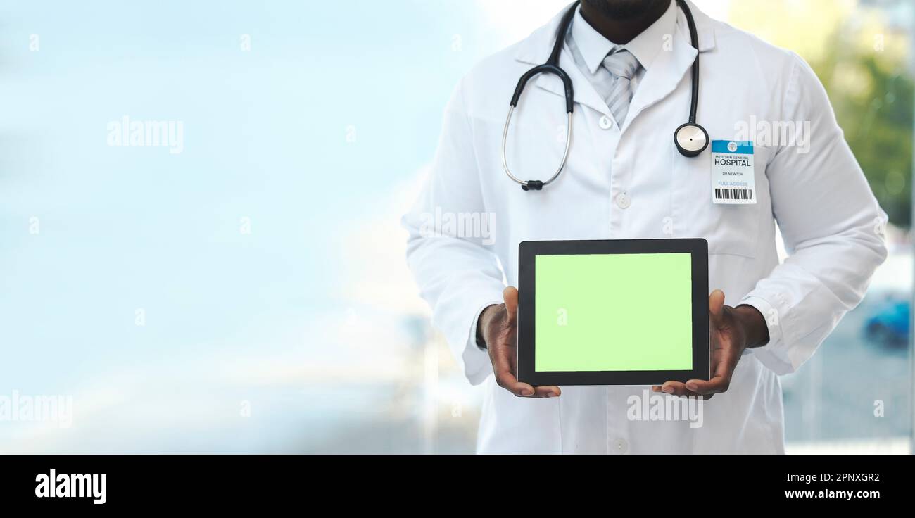 Hands, tablet and green screen with doctor in hospital for promotion ...
