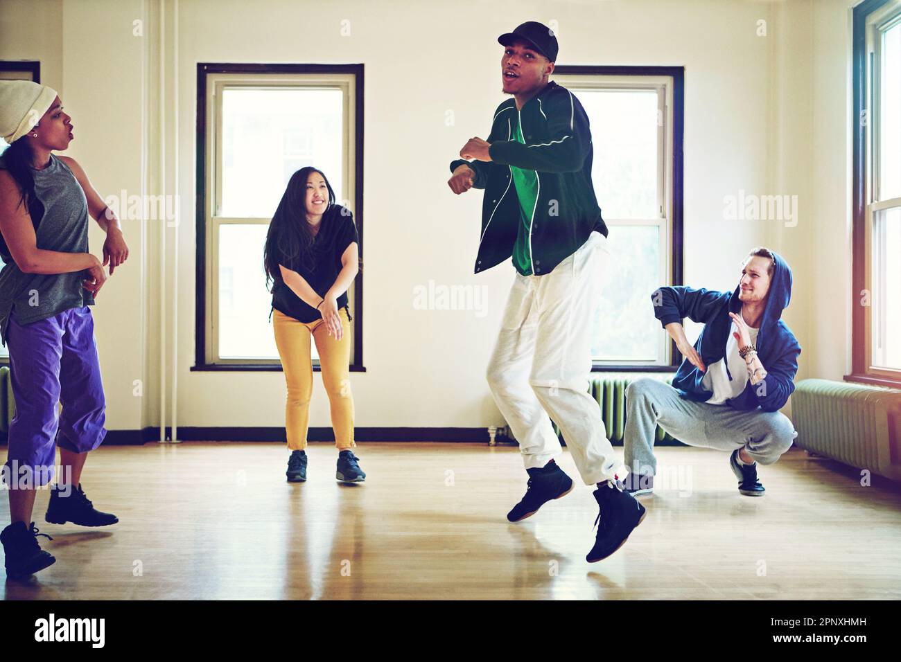 How do they celebrate life They dance. a group of young friends dancing ...