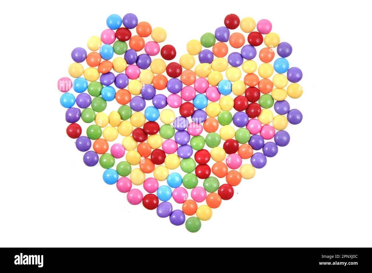color candy heart isolated on the white background Stock Photo - Alamy