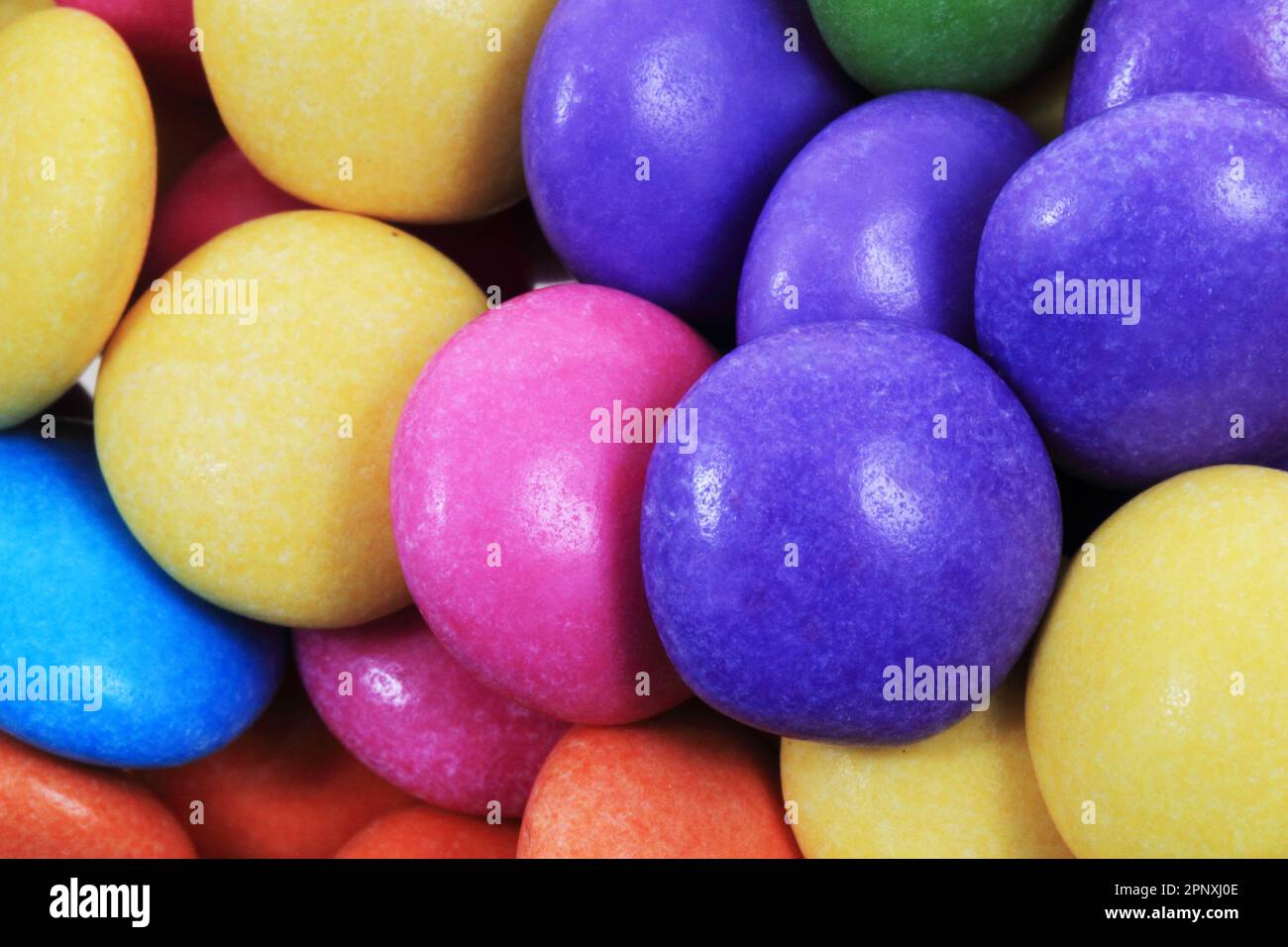 color round candy as sweet sugar background Stock Photo - Alamy