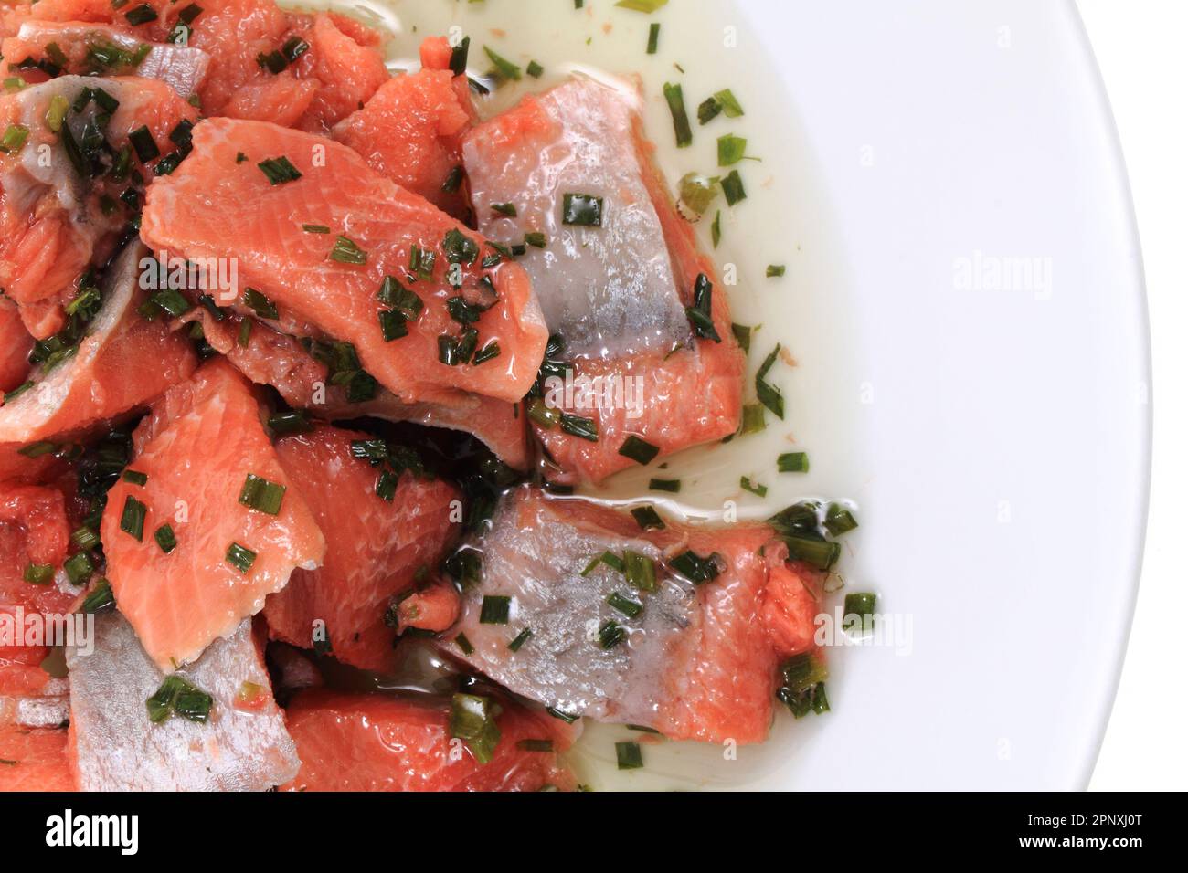 salmon fish pieces in oil as nice gourmet background Stock Photo - Alamy